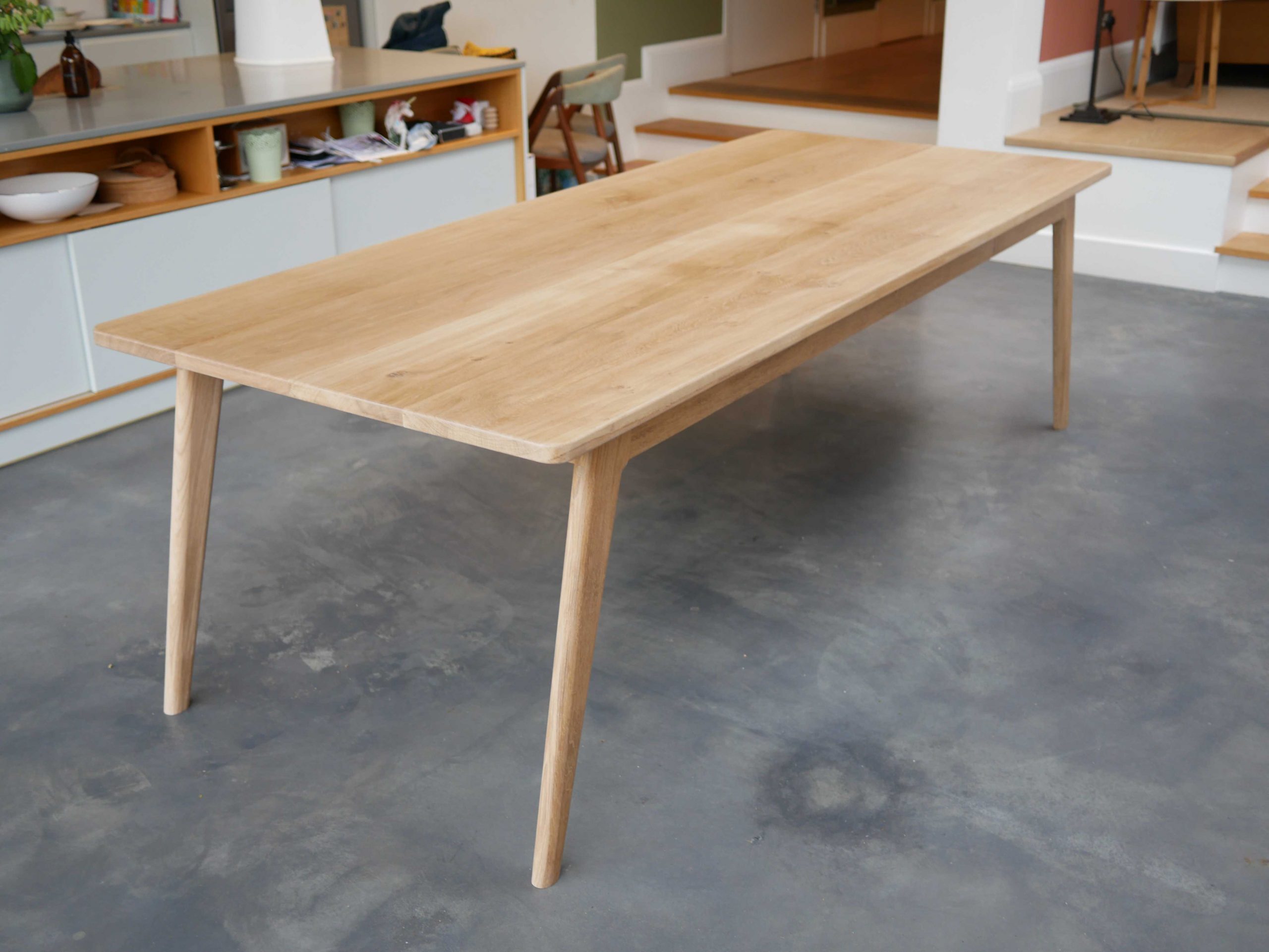 Contemporary oak dining table – Rooted Furniture